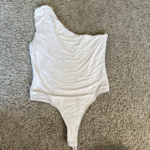 Tops | One Shoulder Cream Bodysuit Medium | Poshmark